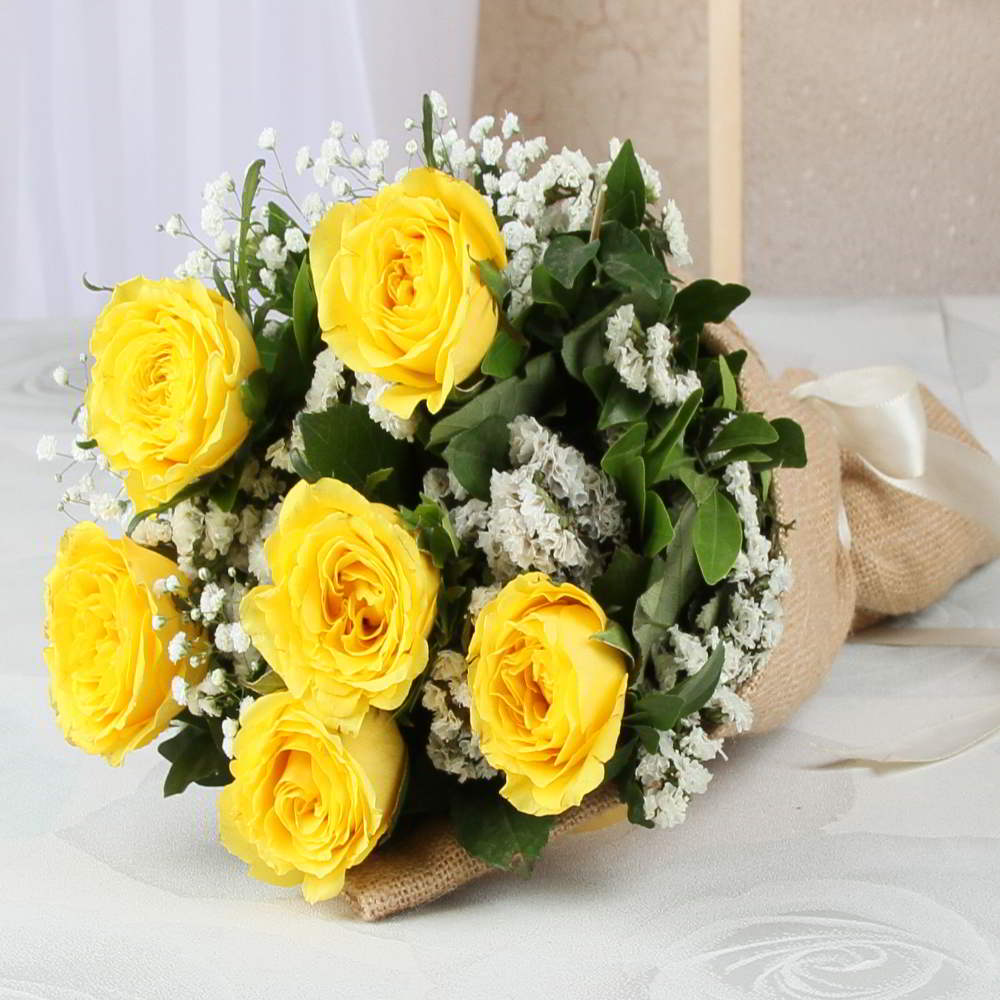 Bouquet of Six Yellow Roses in Jute Wrapping – Flowersacrossindia.com